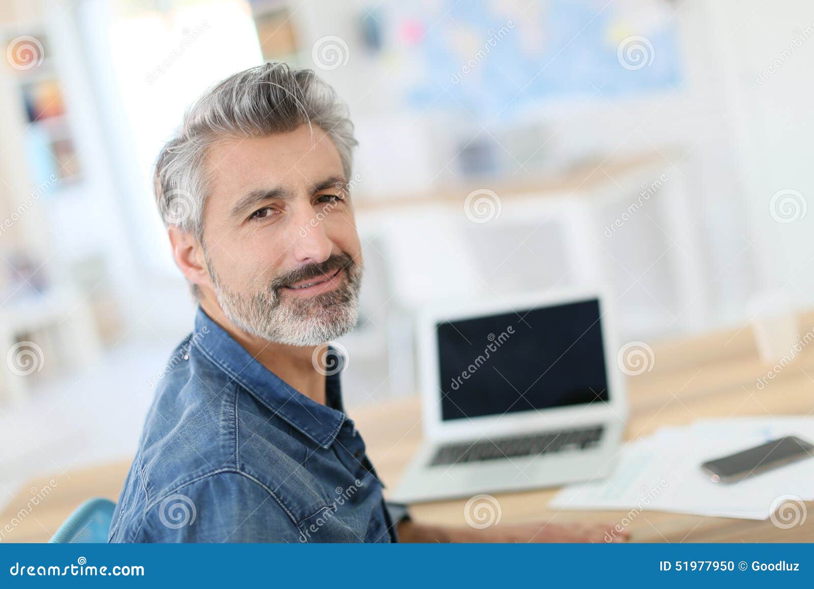 Mature Professor Working on Laptop Stock Photo - Image of shirt, laptop ...