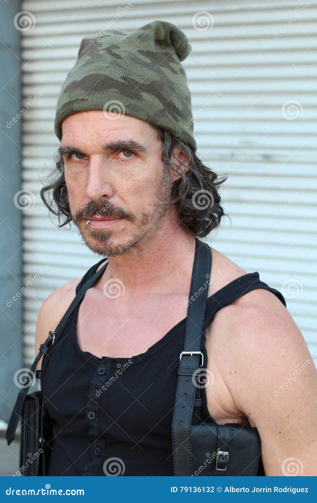 Mature Rebel Rocker Shows Emotion on Industrial Setting Stock Photo ...
