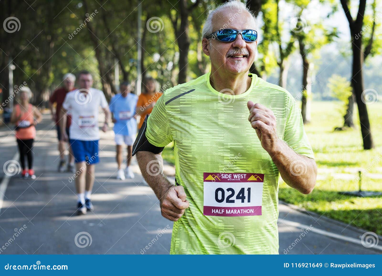Mature Runners Running in a Race Stock Image - Image of jogger, game ...