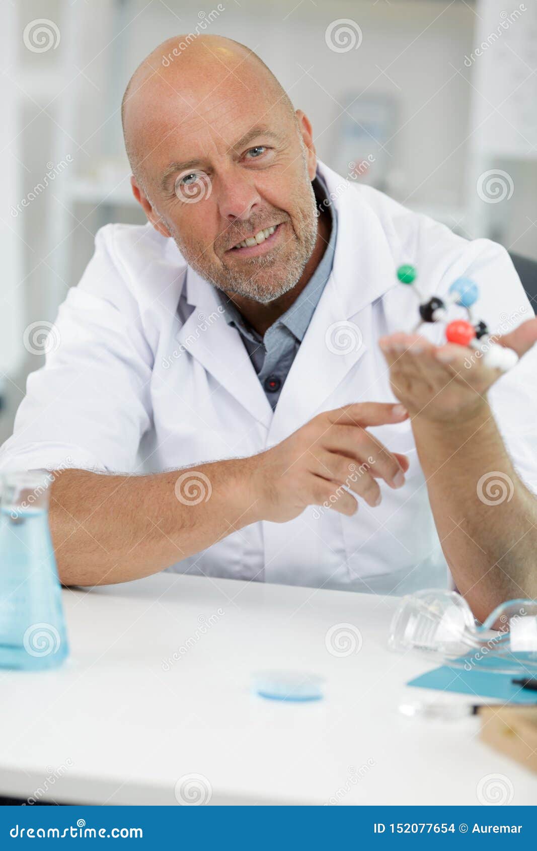 Mature Scientist Making Research Over Dna Molecule Structure Stock ...