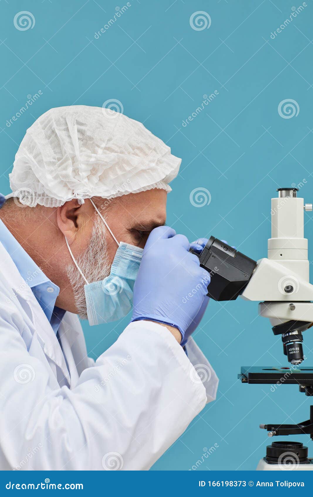 Scientist using microscope stock image. Image of chemistry - 166198373