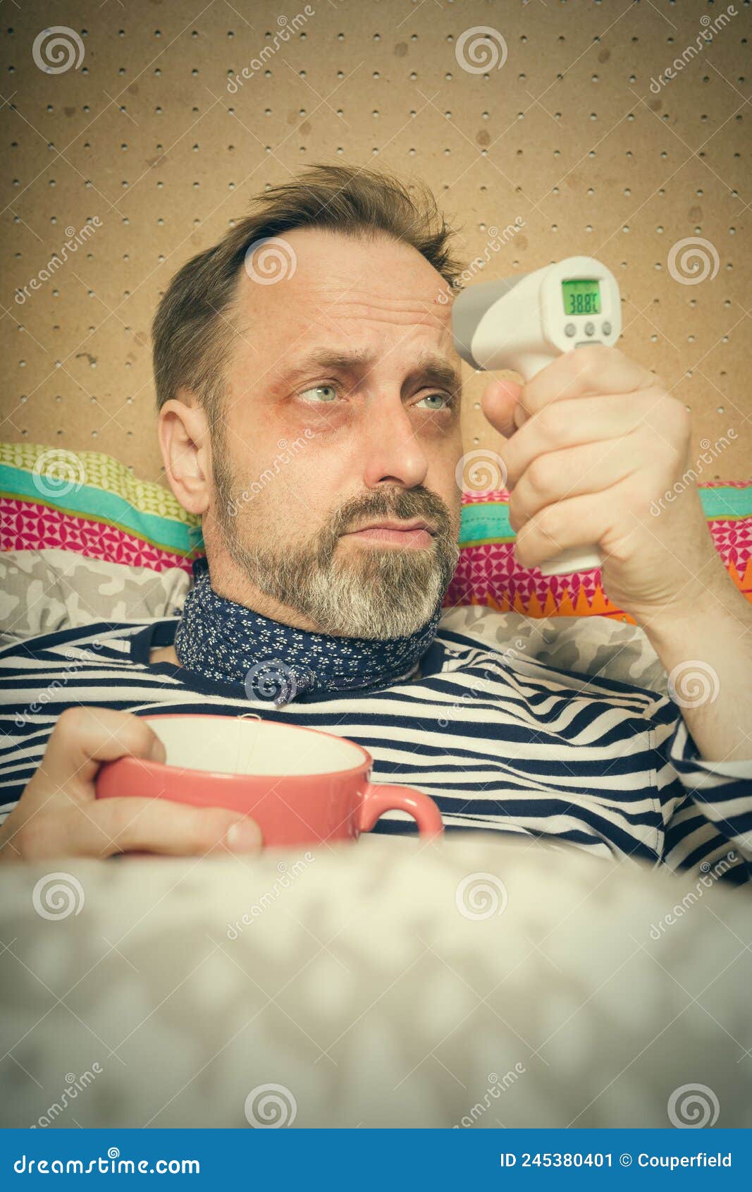 Sick Man with Flu and Cold Checking His Teplerature with Thermometer ...