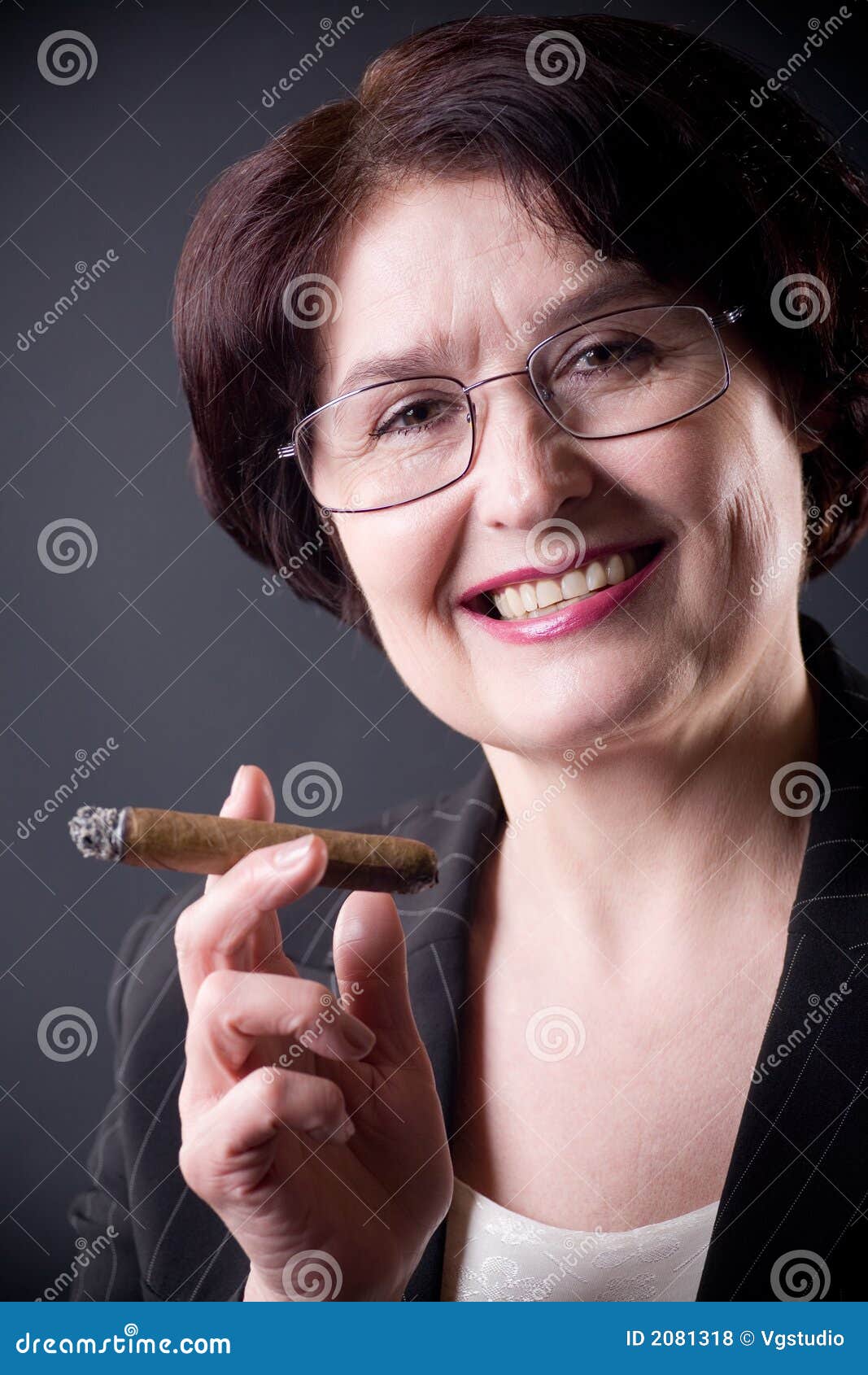 Mature Solid Businesswoman with Cigar, Smiling Stock Photo - Image of ...