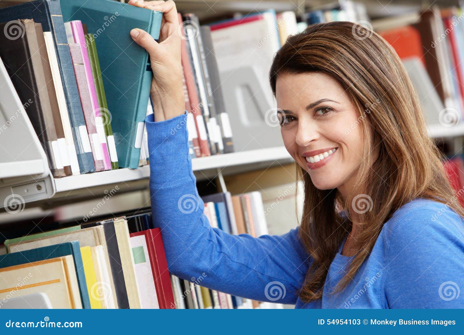 Mature student in library stock image. Image of library - 54954103