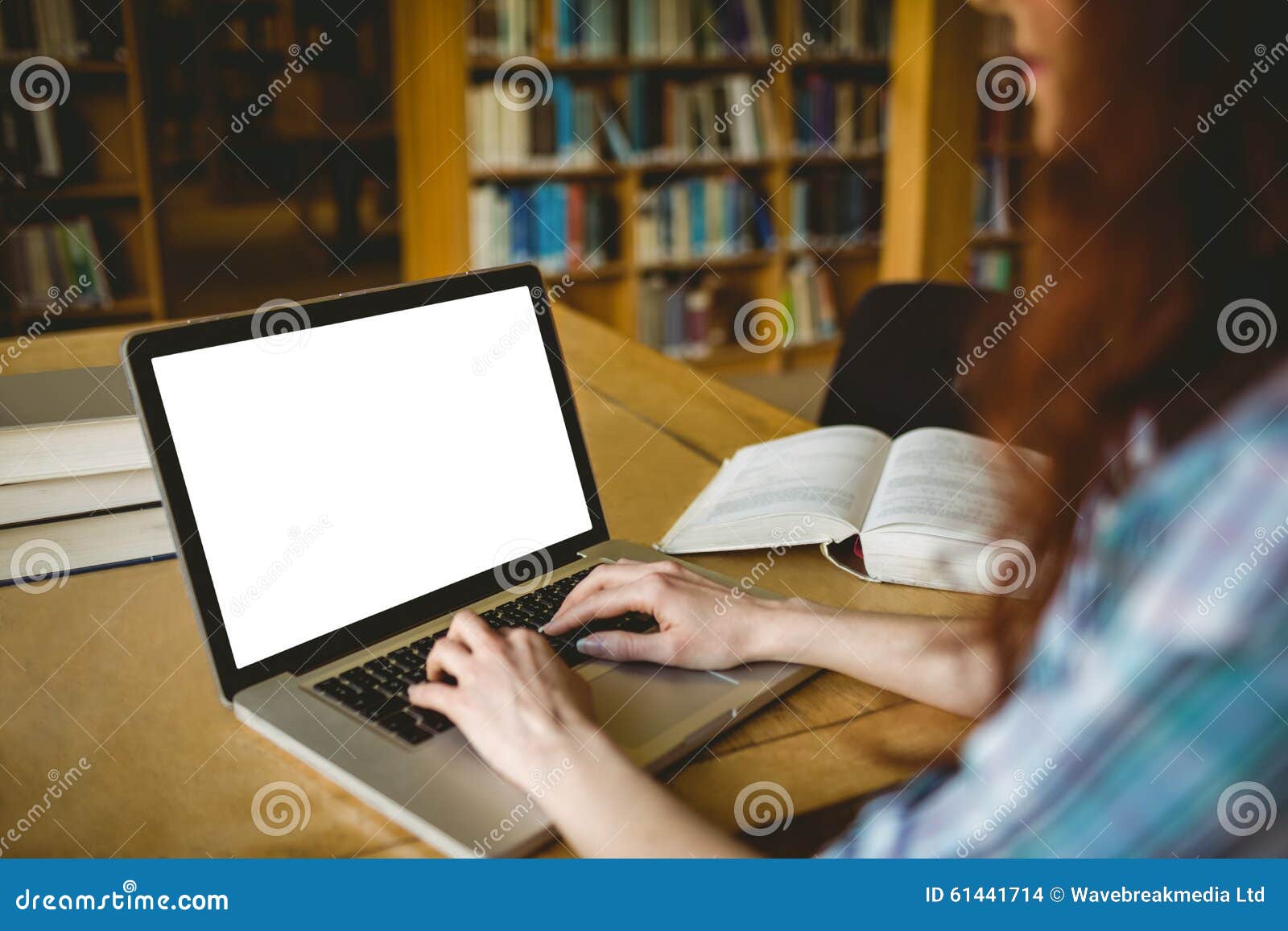 Mature Student Studying in Library with Laptop Stock Photo - Image of ...