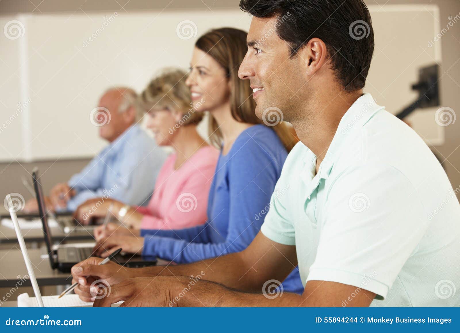 Mature students in class stock photo. Image of notes - 55894244