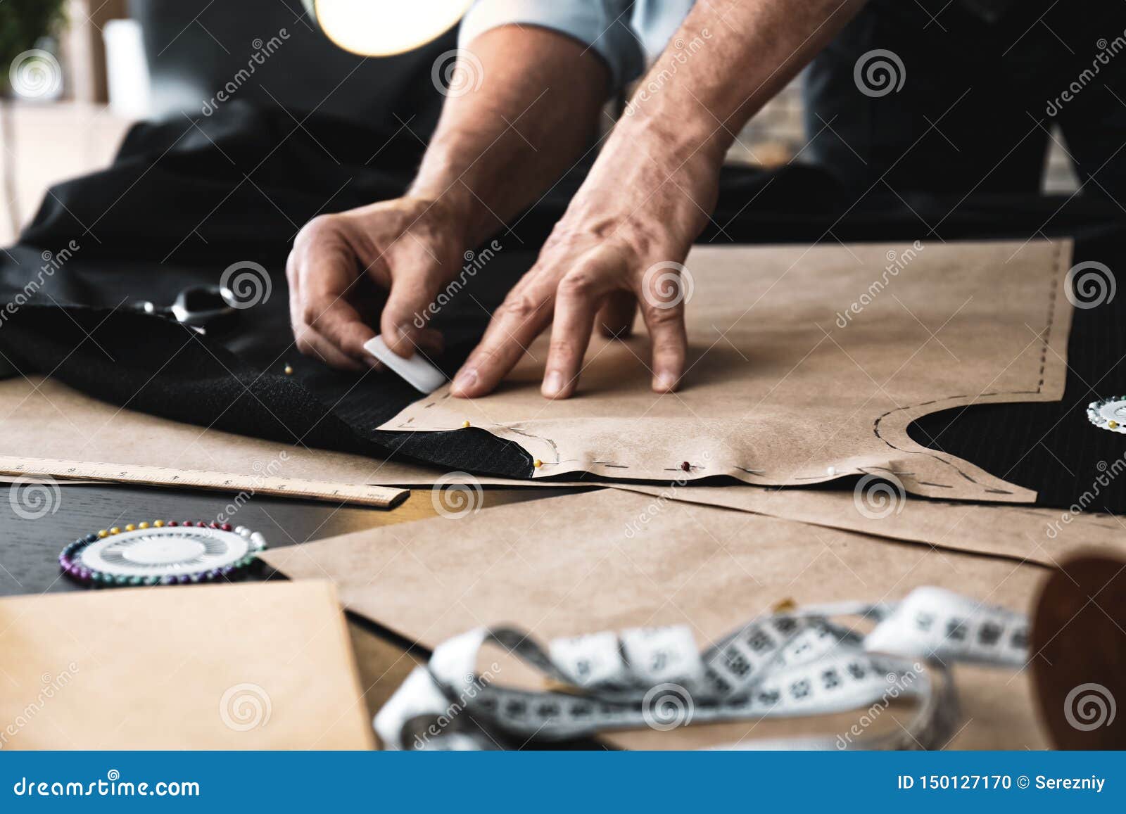 Mature Tailor Working with Sewing Pattern in Atelier Stock Photo ...