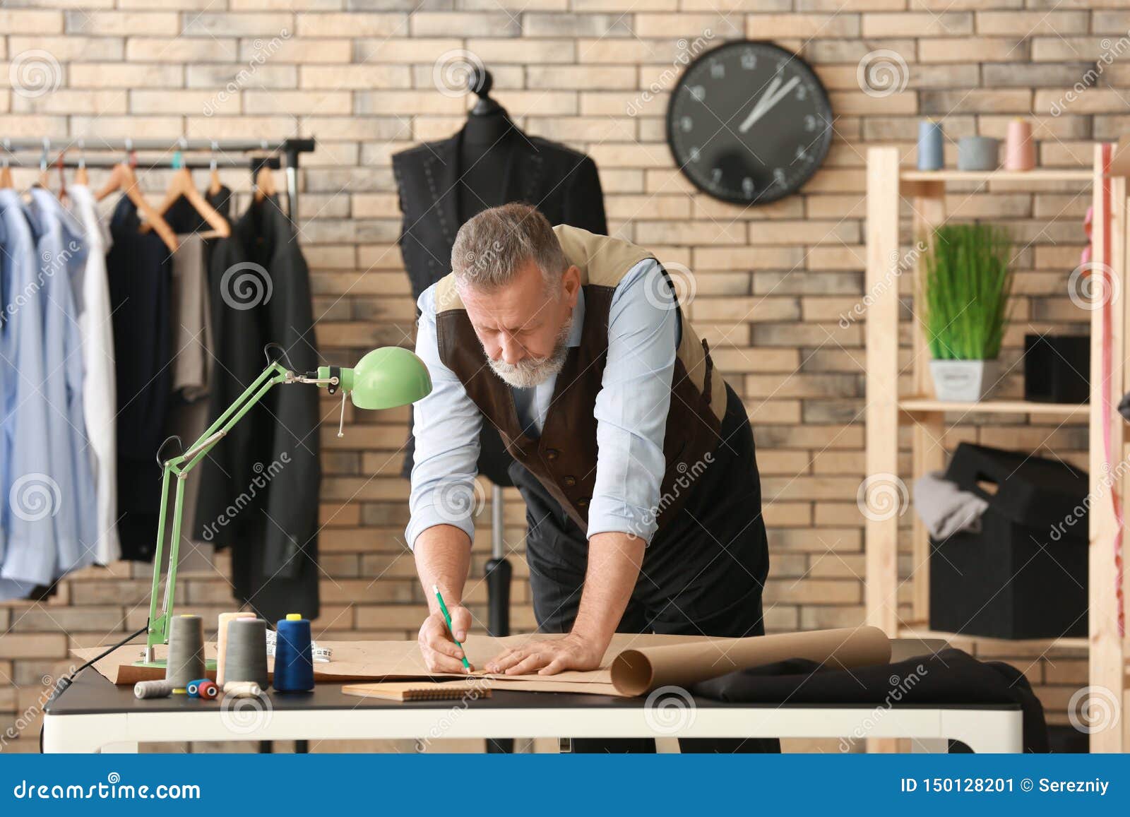 Mature Tailor Working with Sewing Pattern in Atelier Stock Image ...