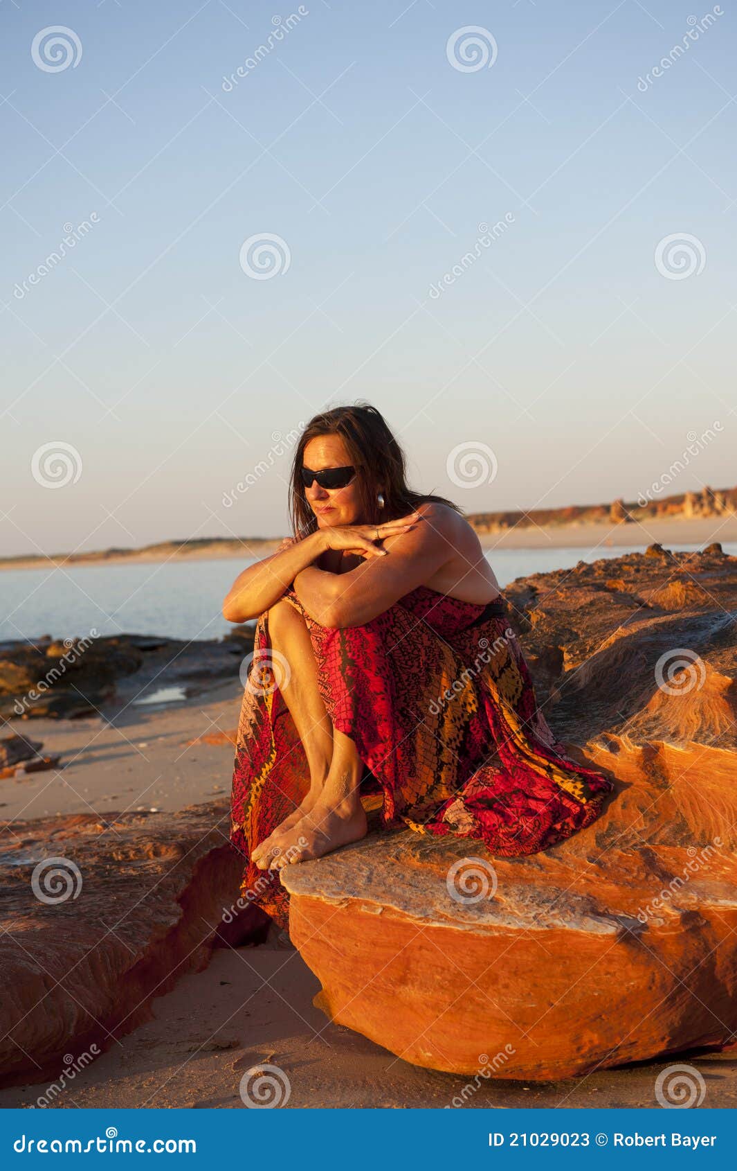 Mature Woman Beach at Sunset Stock Image - Image of coast, hand: 21029023