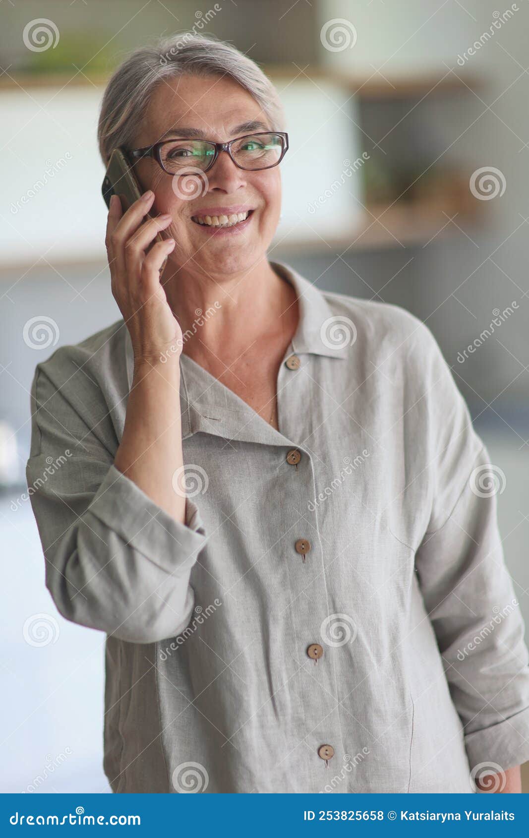 Mature Woman Calling on the Phone in the Office Stock Photo - Image of ...