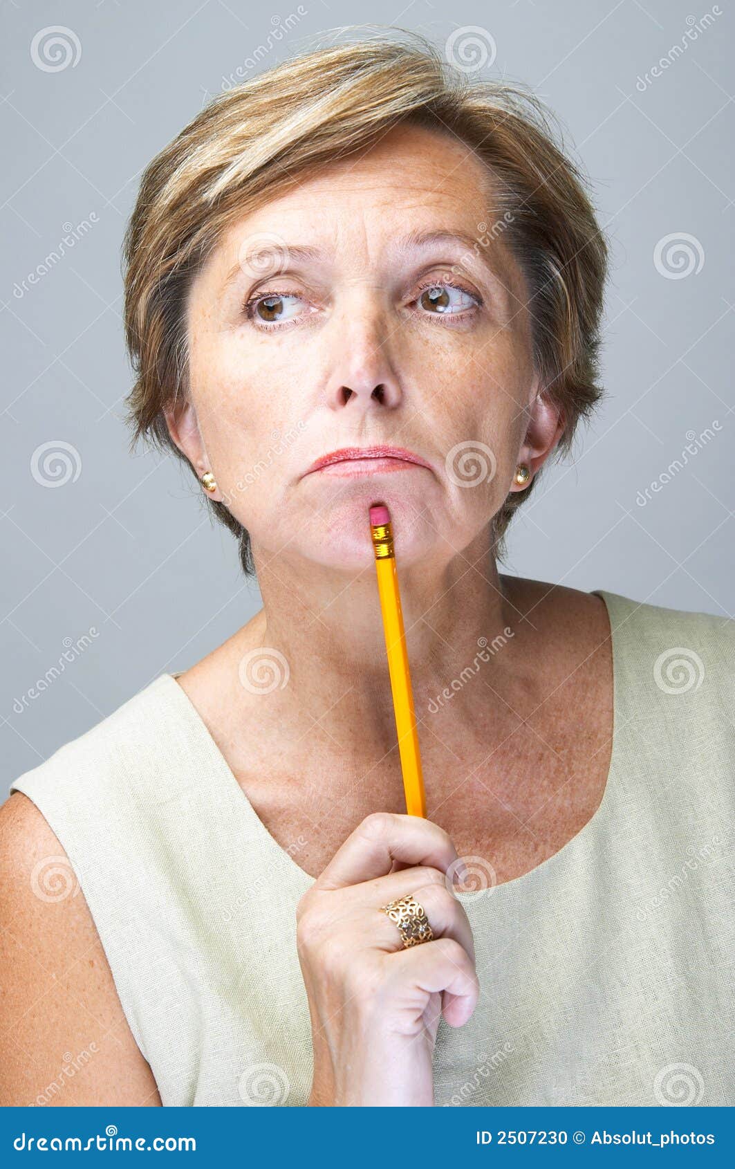 Mature woman contemplating stock photo. Image of fifties - 2507230