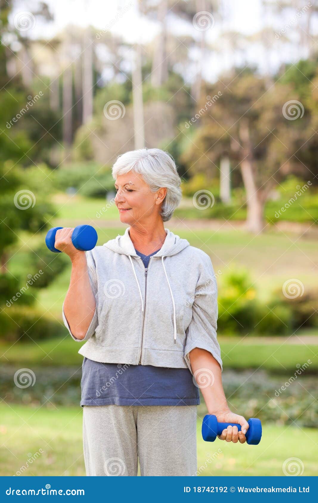 Mature Woman Doing Her Exercises Stock Photo - Image of countryside ...