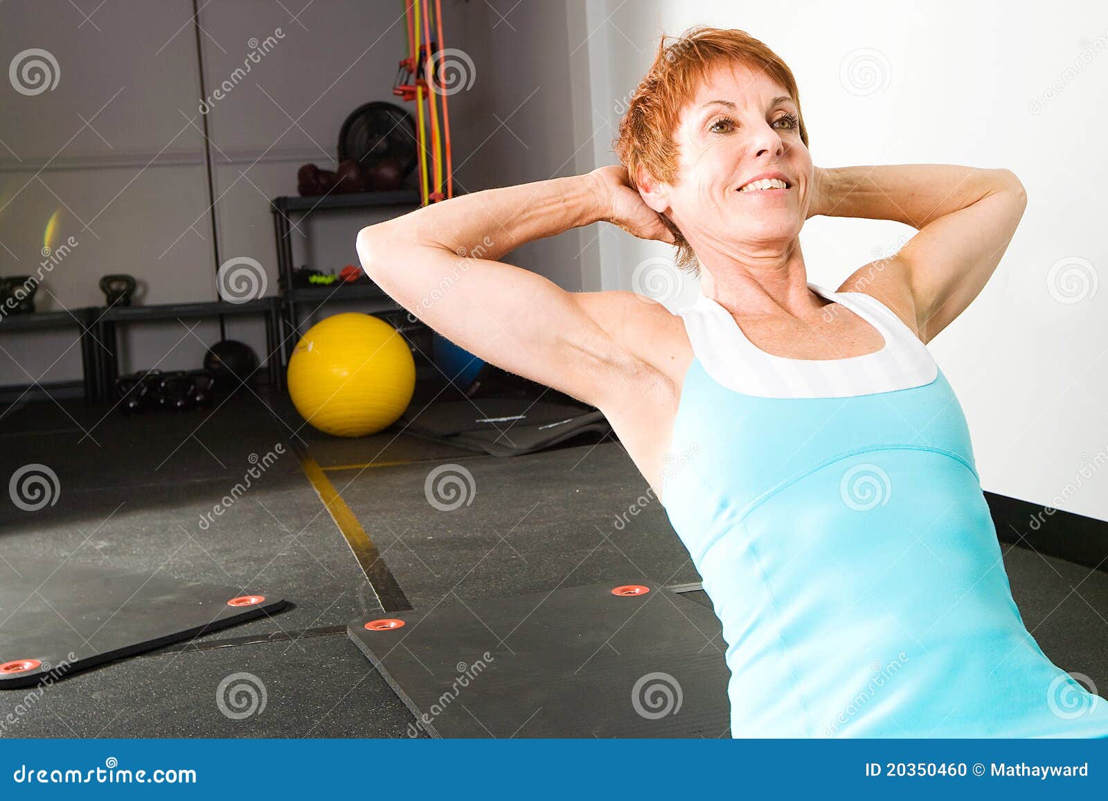Mature Woman doing Pilates stock photo. Image of stomach - 20350460