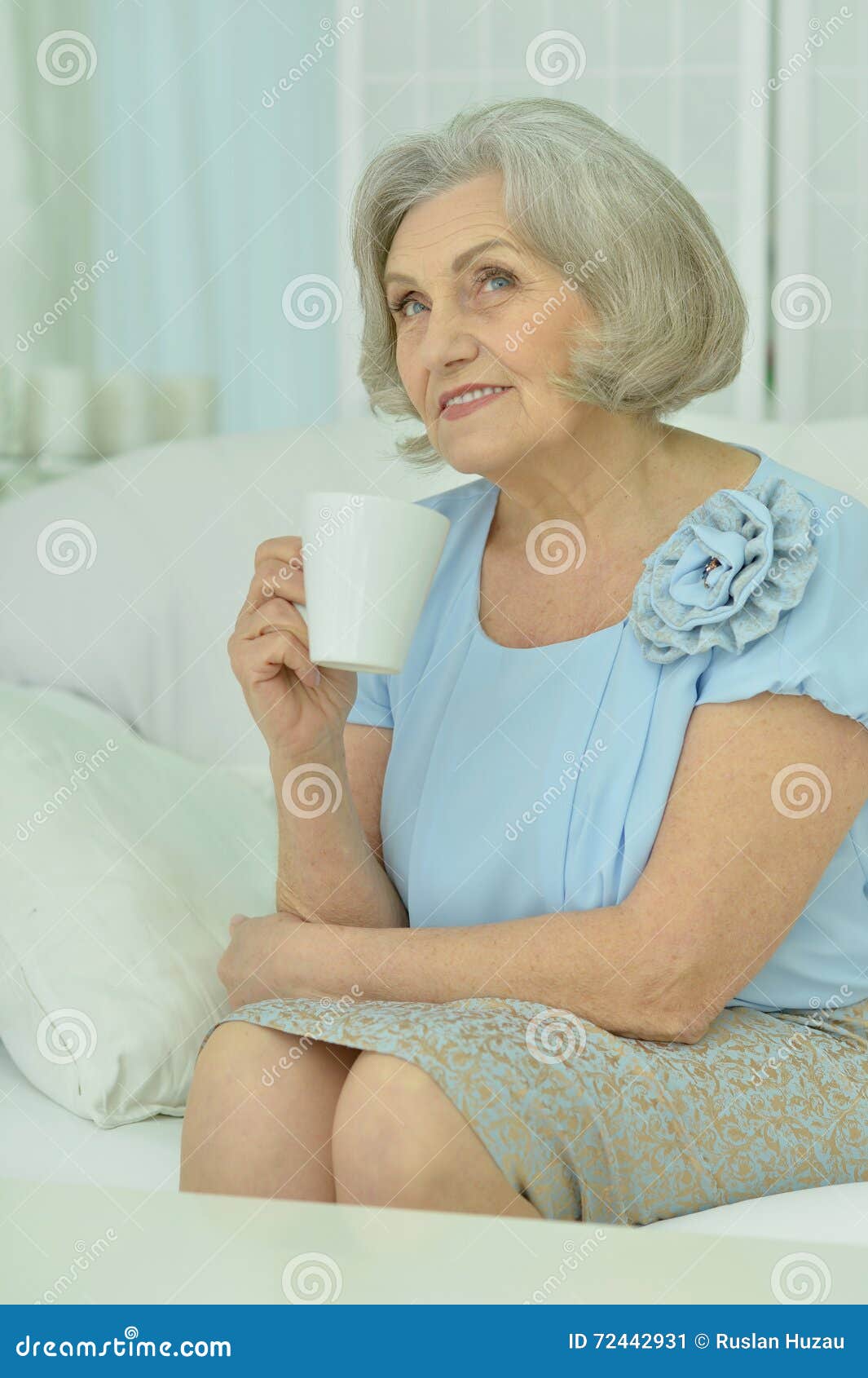 Mature woman drinking tea stock image. Image of retired - 72442931