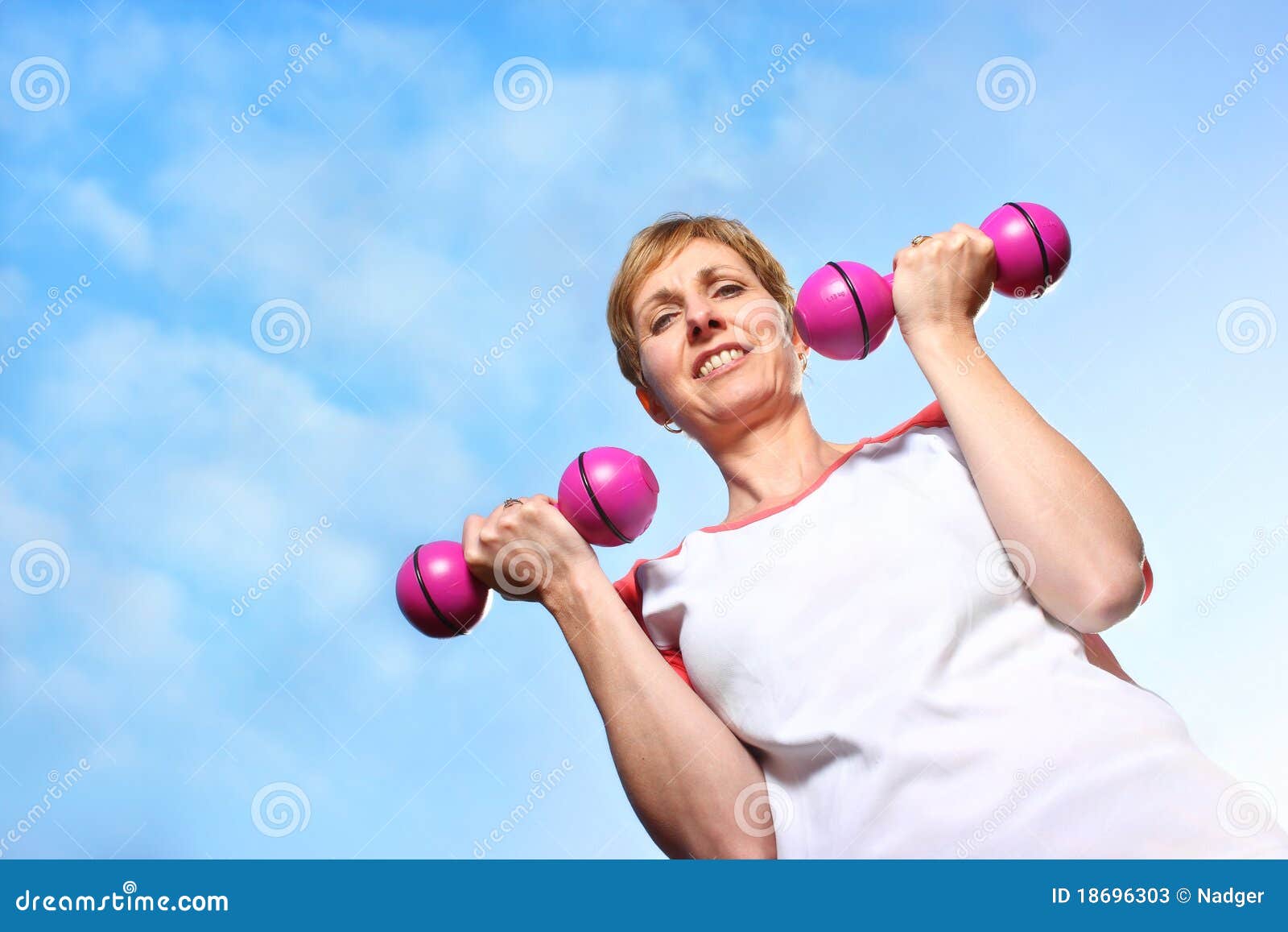 Mature Woman Exercising Outdoors Stock Image - Image of lift, leisure ...