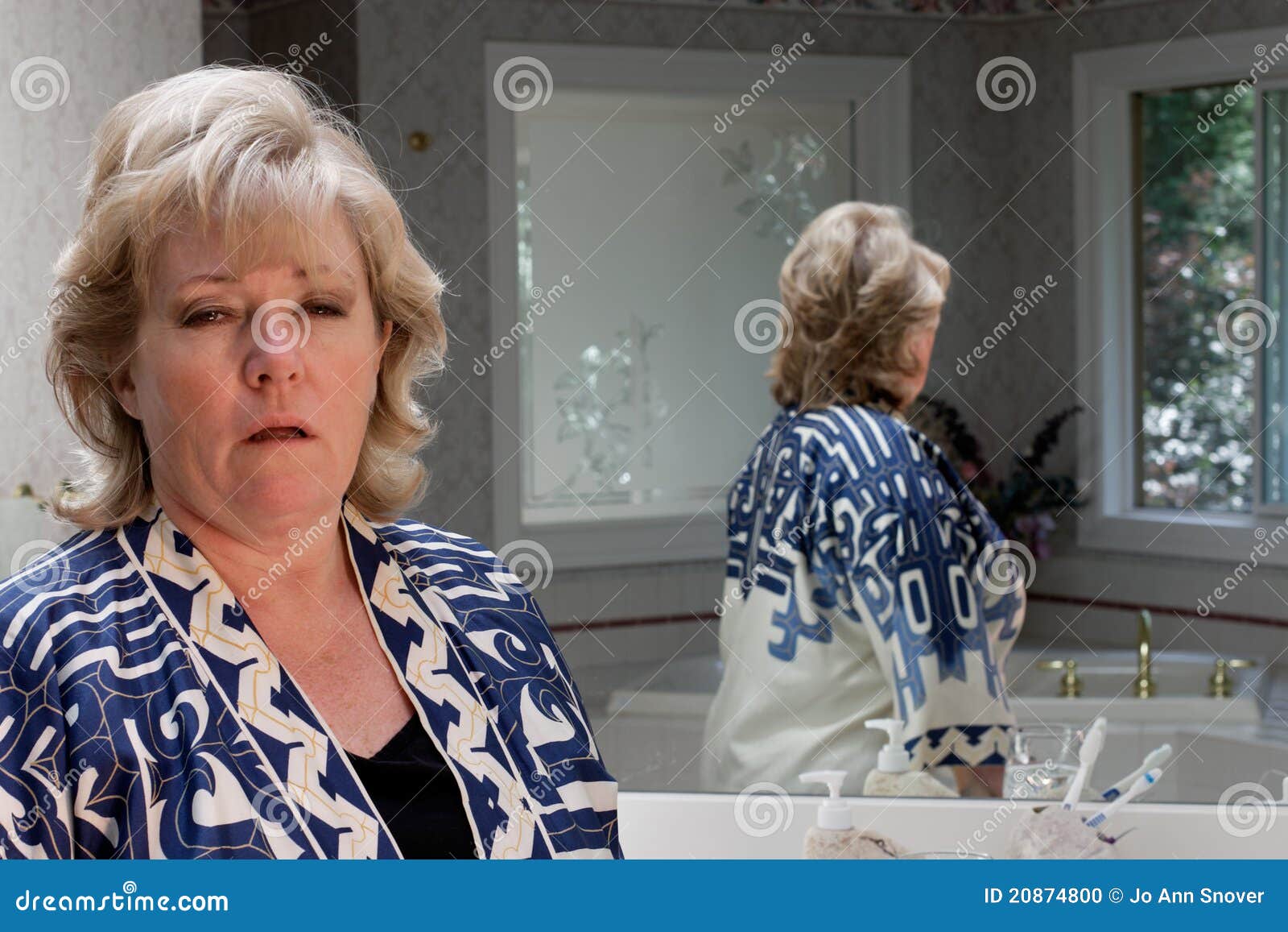 Mature woman feels awful stock photo. Image of robe, sick - 20874800