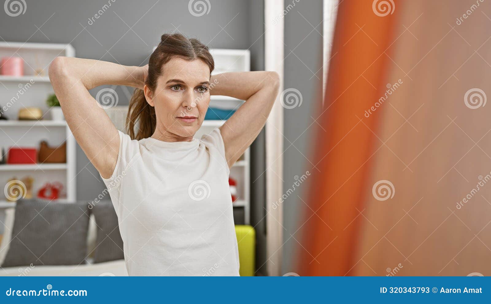 Mature Woman Getting Dressed in a Modern Wardrobe Room Stock Image ...
