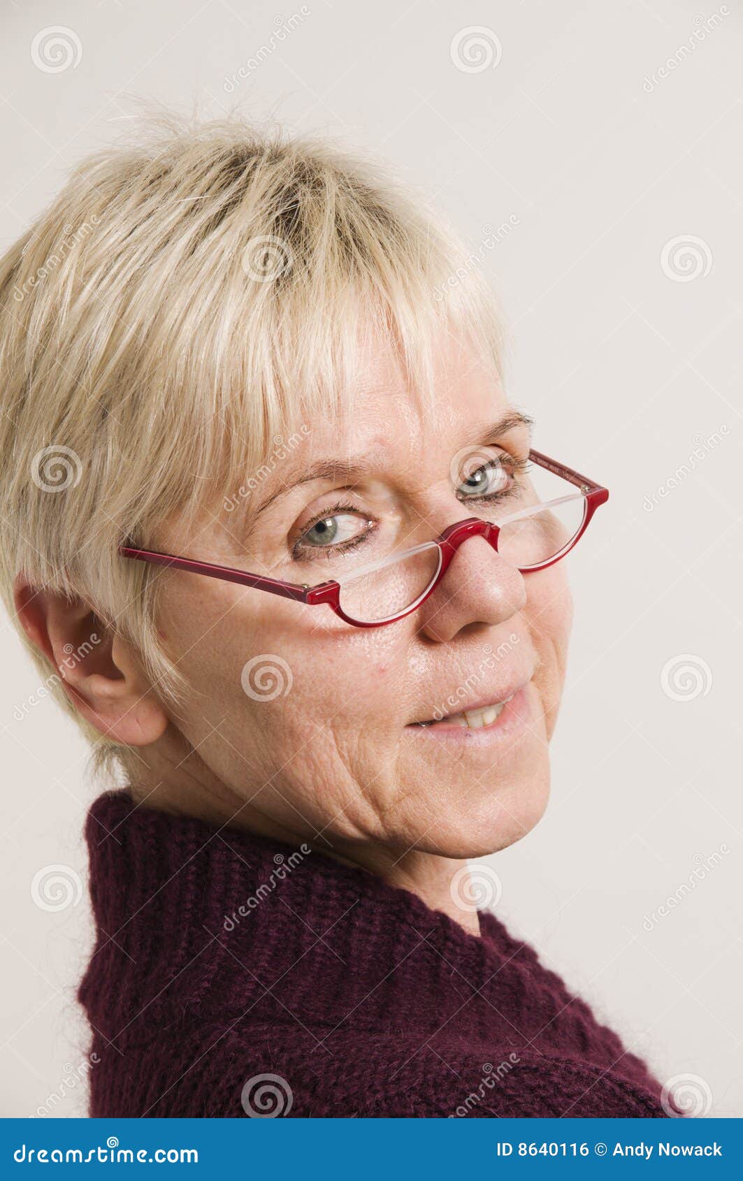 Mature woman with glasses stock photo. Image of concept - 8640116