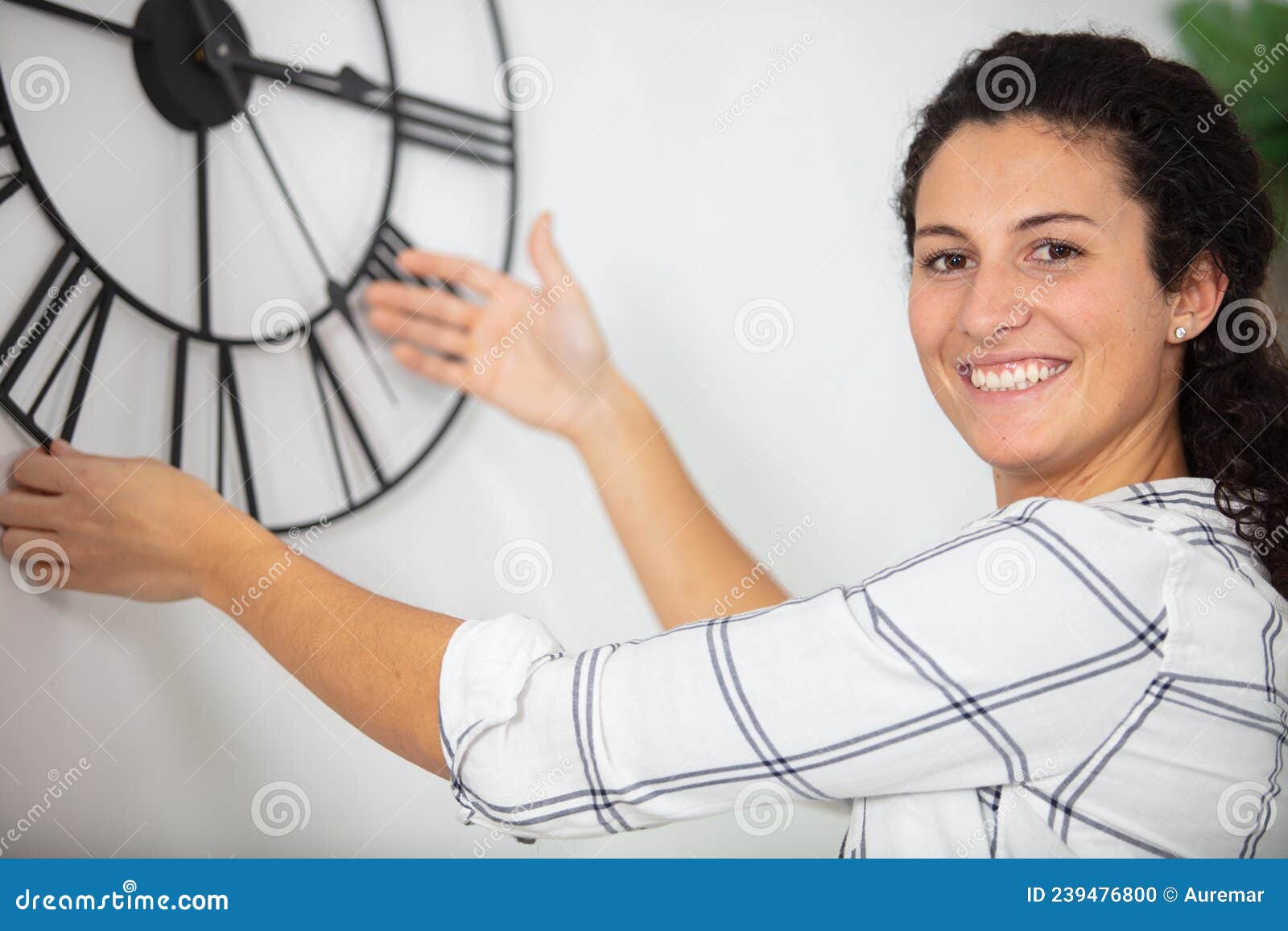 Mature Woman Hanging Clock on Wall Stock Photo - Image of summer ...
