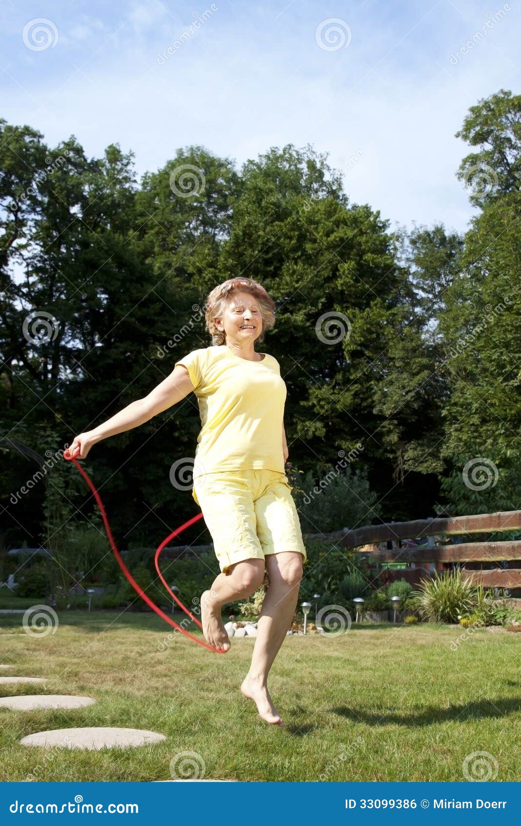 Mature Woman Has Fun Jumping Rope Stock Photo - Image of beautiful ...