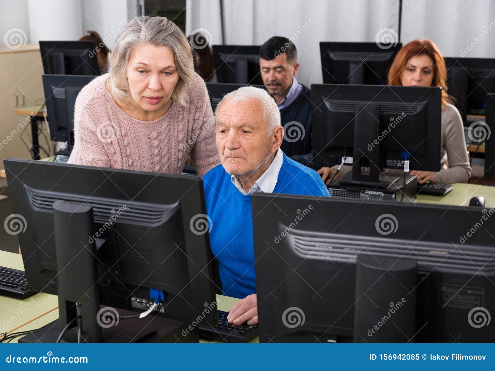 Mature Woman Helping Senior Man To Use Computer Stock Image - Image of ...