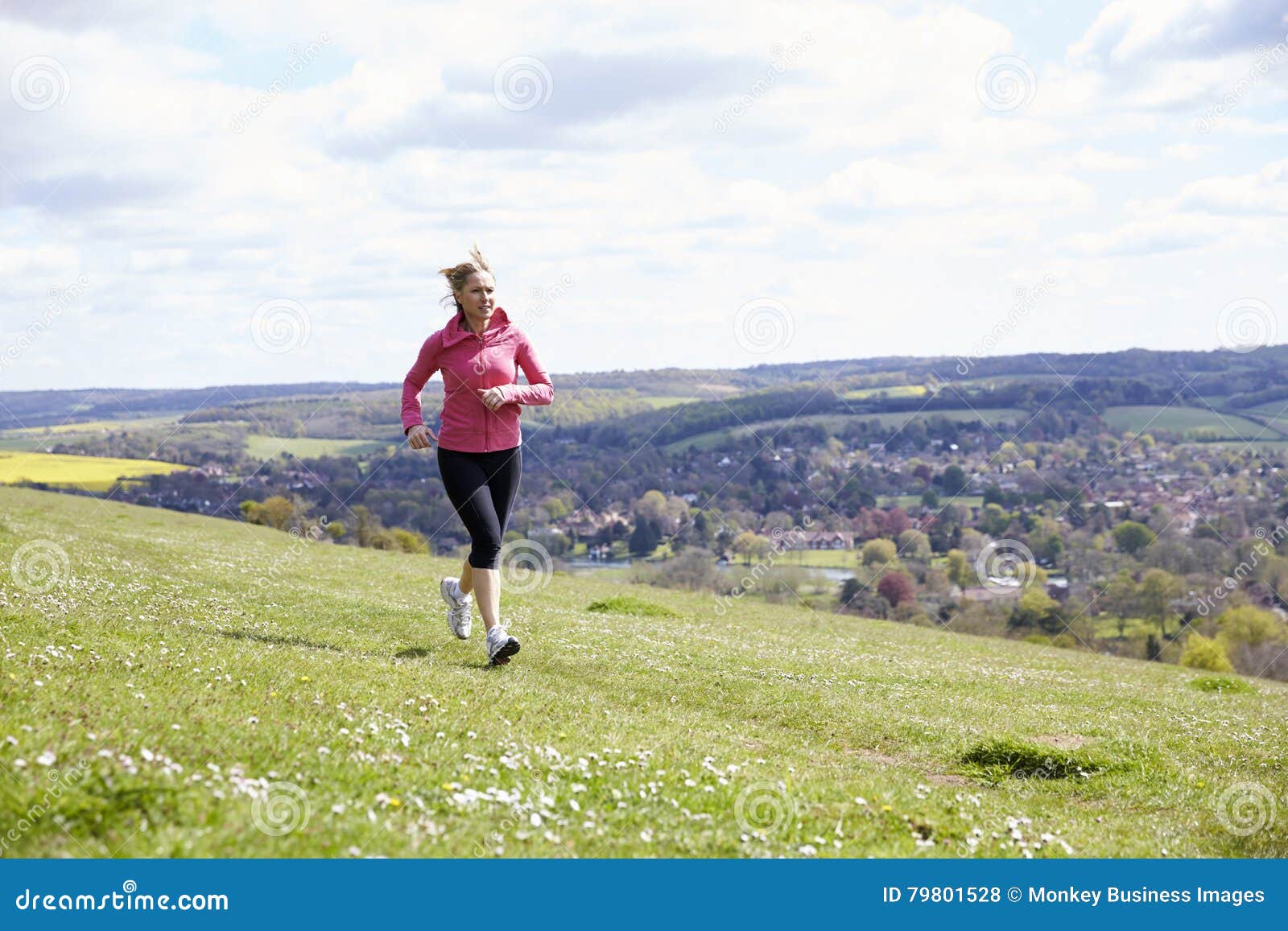 Mature Woman Jogging in Countryside Stock Photo - Image of space ...