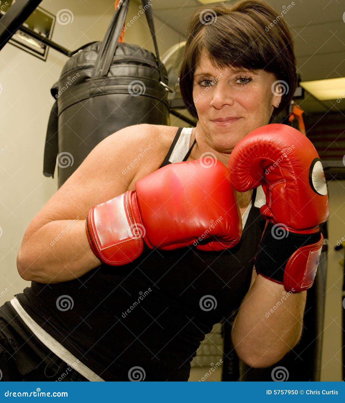 Mature Woman kickboxing stock photo. Image of athleticism - 5757950