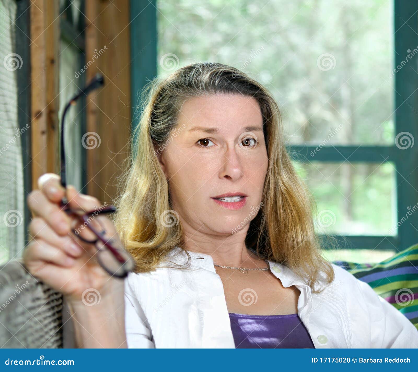 Mature Woman Looking Doubtful and Worried Stock Photo - Image of middle ...