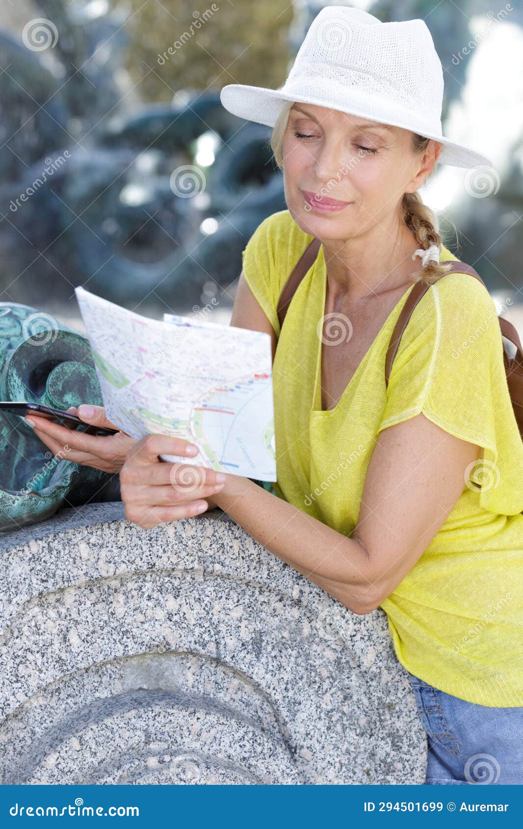 Mature woman with map stock image. Image of outdoors - 294501699