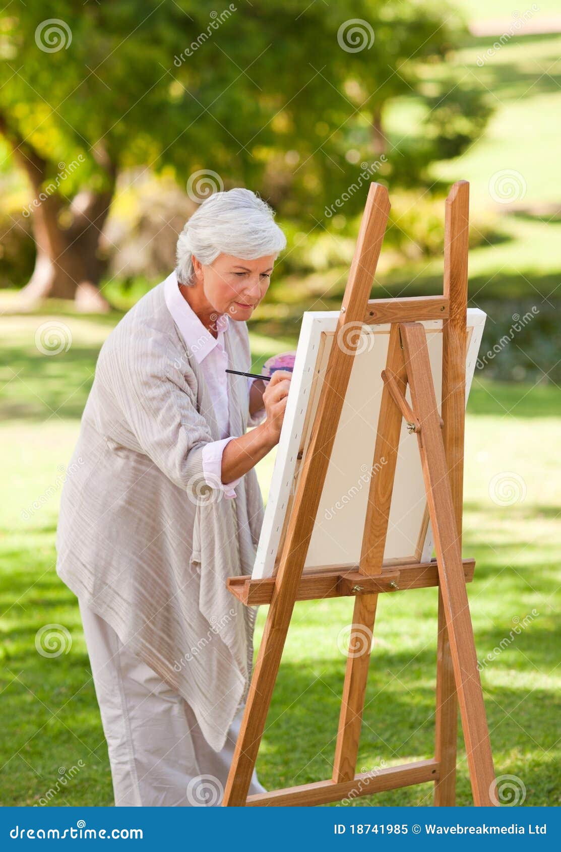 Mature woman painting stock image. Image of palette, adult - 18741985
