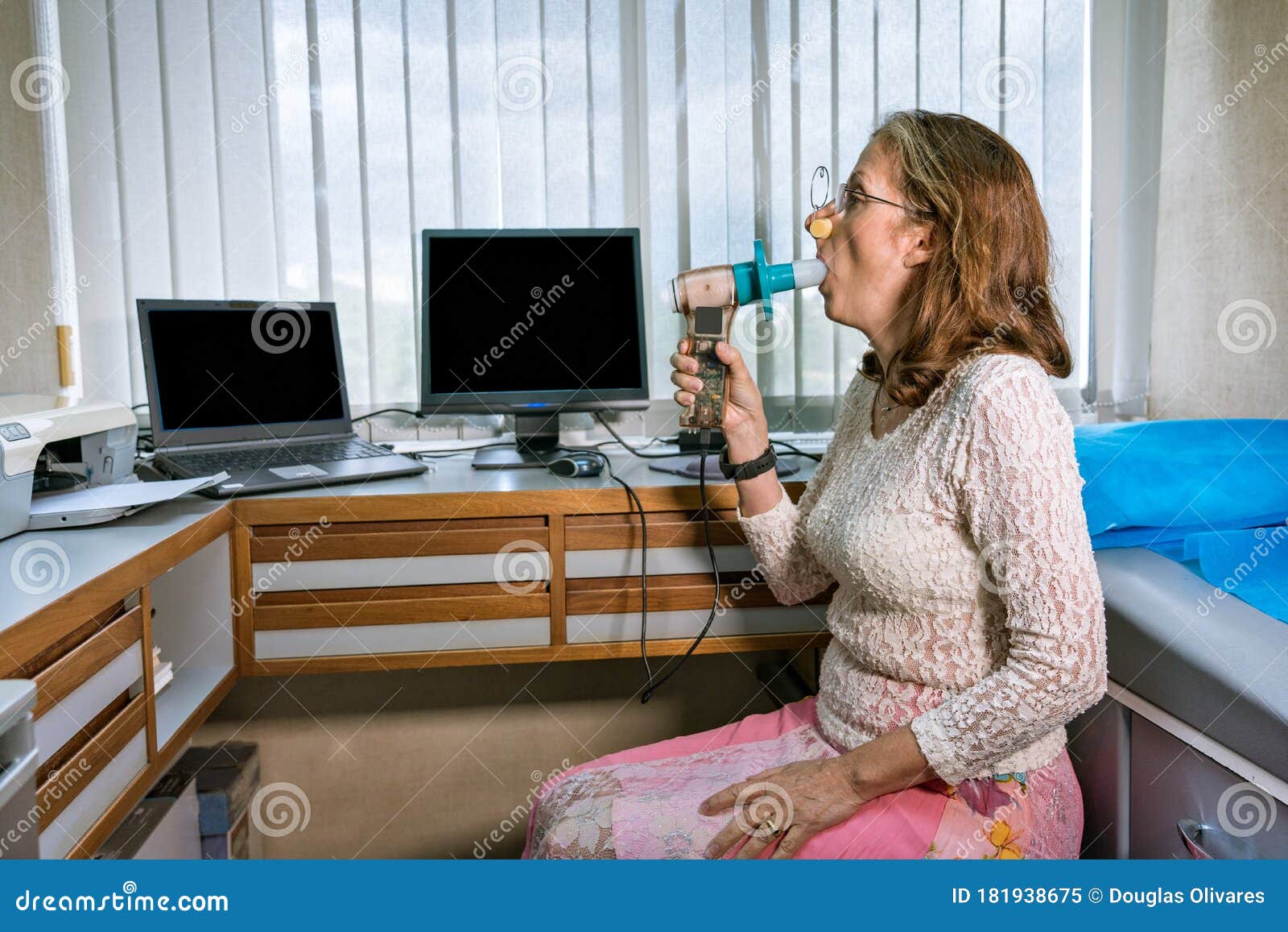 Mature Woman Performing Pulmonary Function Test and Spirometry Stock ...