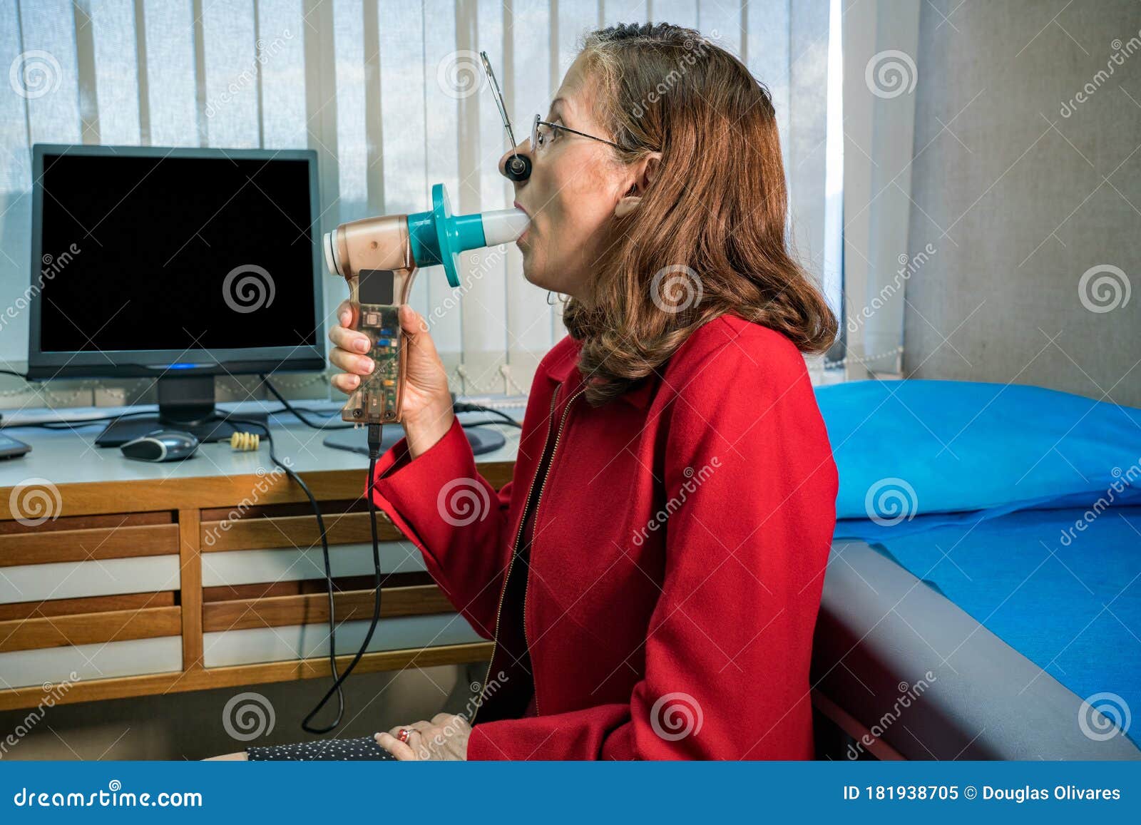 Mature Woman Performing Pulmonary Function Test and Spirometry Stock ...