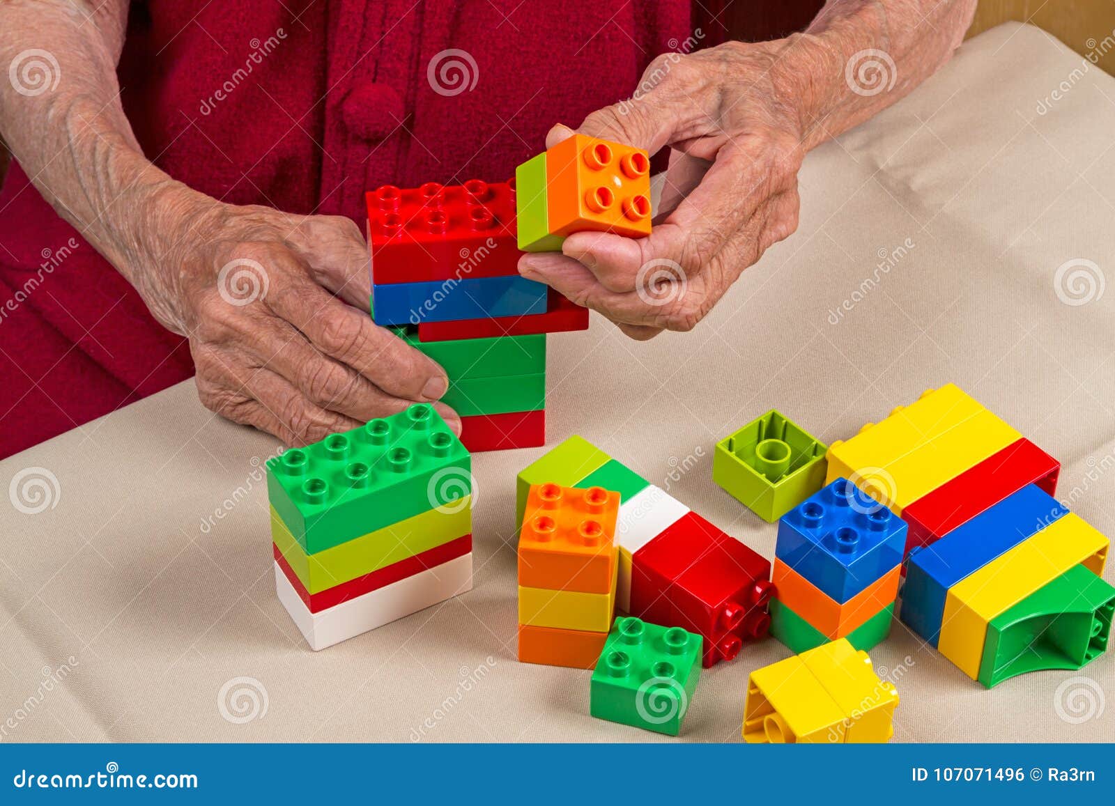 Mature Woman with Plastic Blocks Stock Photo - Image of finger, aging ...