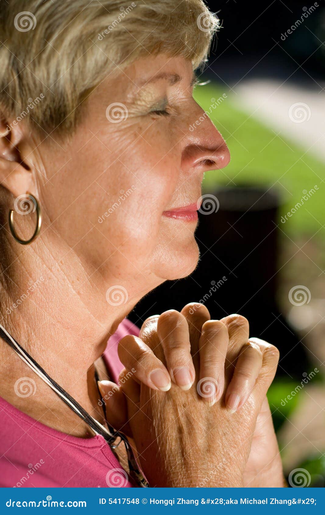 Mature woman praying stock photo. Image of head, face - 5417548