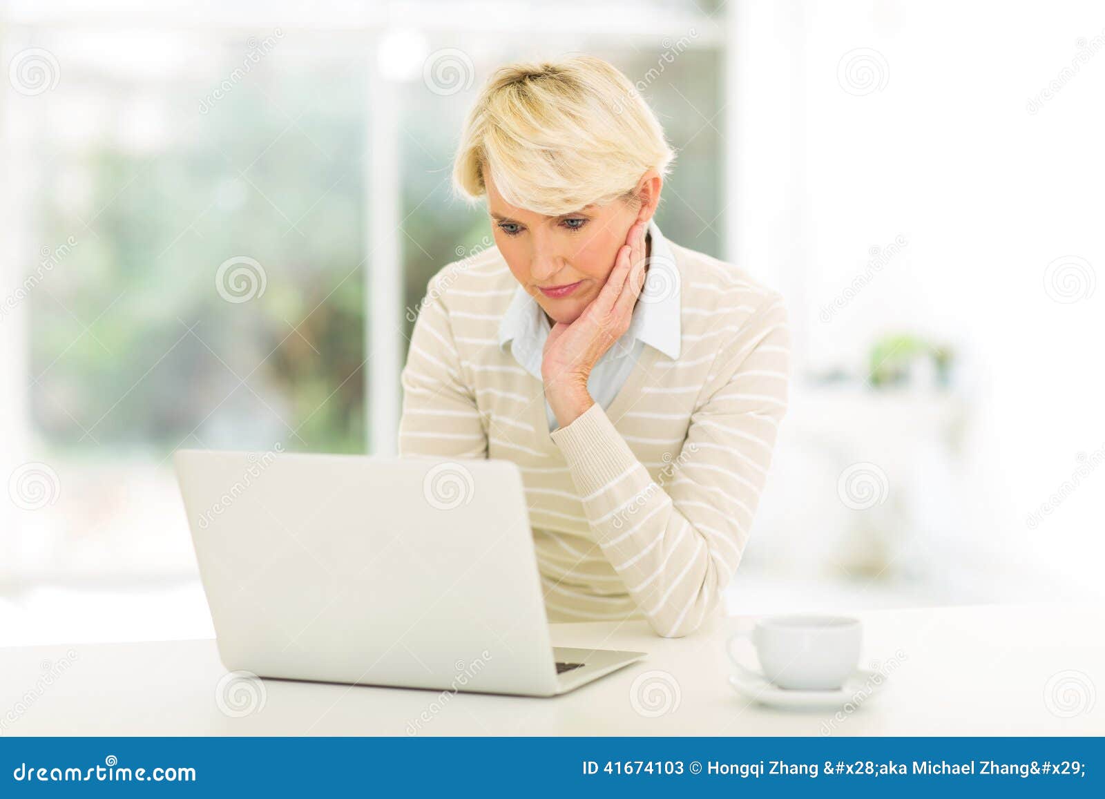 Mature Woman Reading Emails Stock Image - Image of home, aged: 41674103