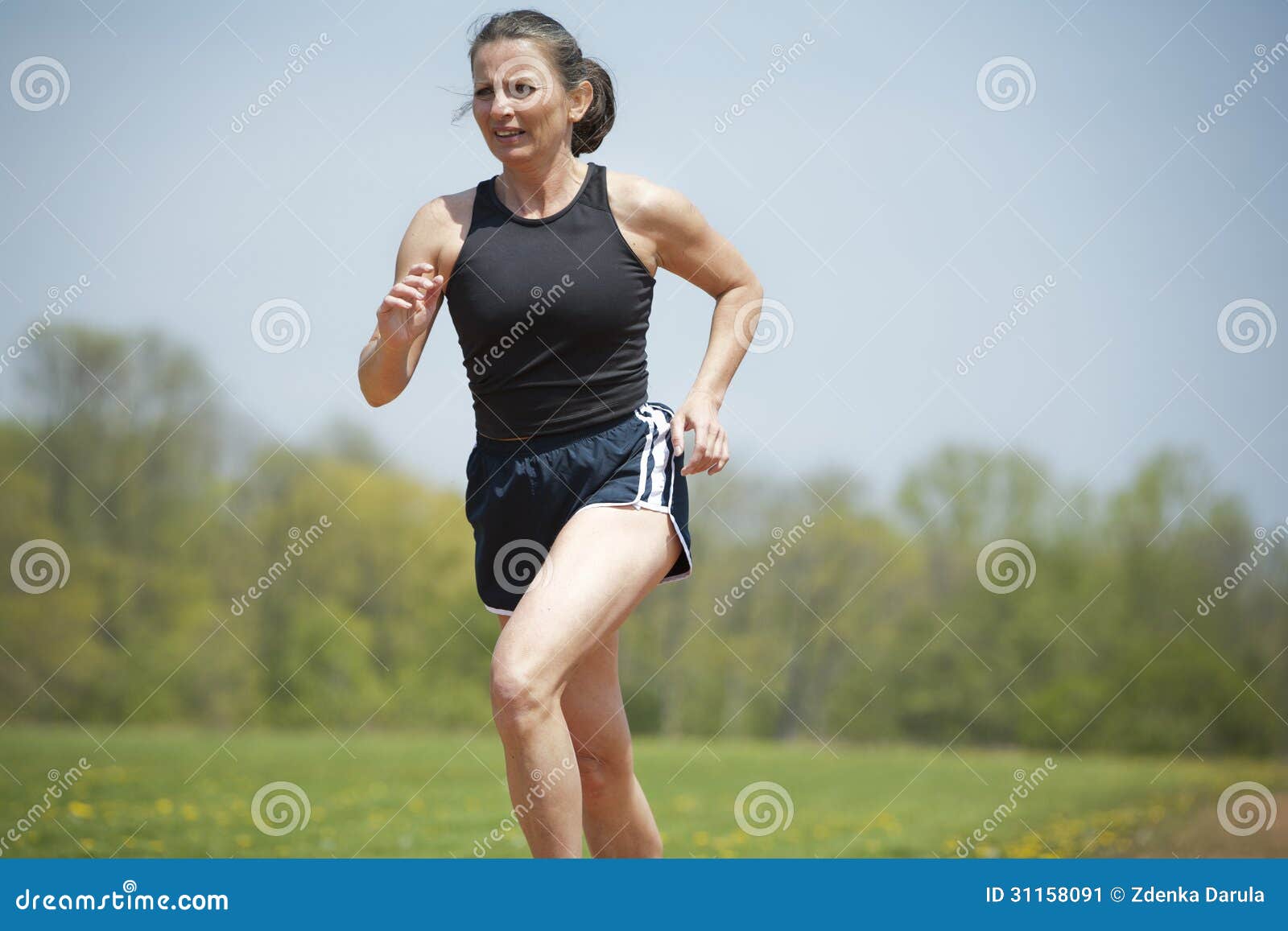 Mature woman running stock image. Image of outside, retired - 31158091