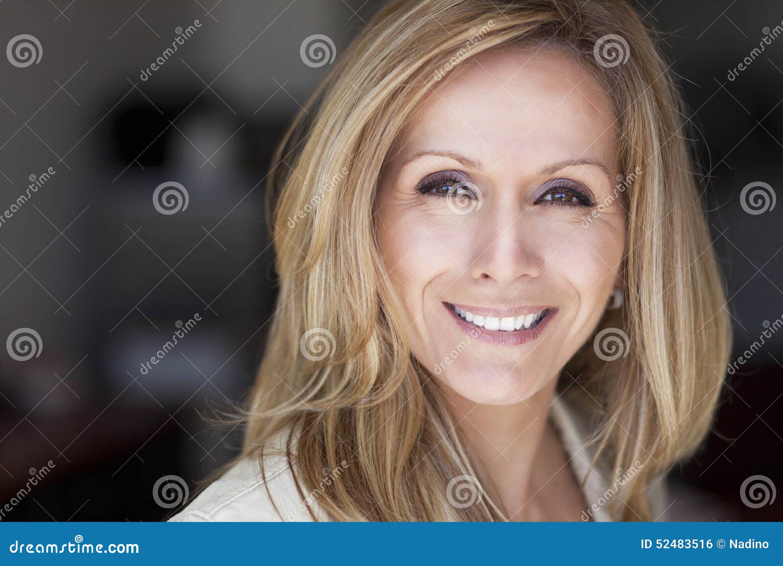 Mature Woman Smiling at the Camera Stock Photo - Image of businesswoman ...