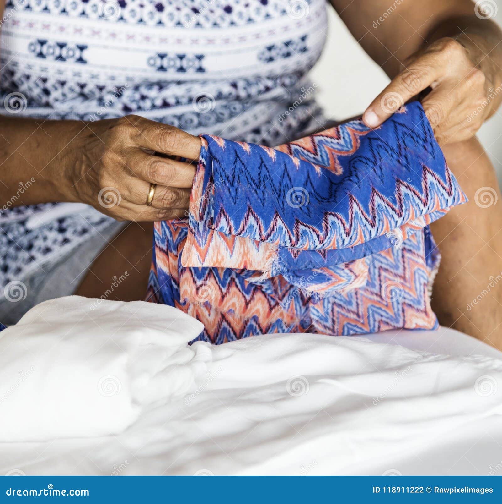 Mature Woman Unpacking Her Clothes Stock Photo - Image of summer ...