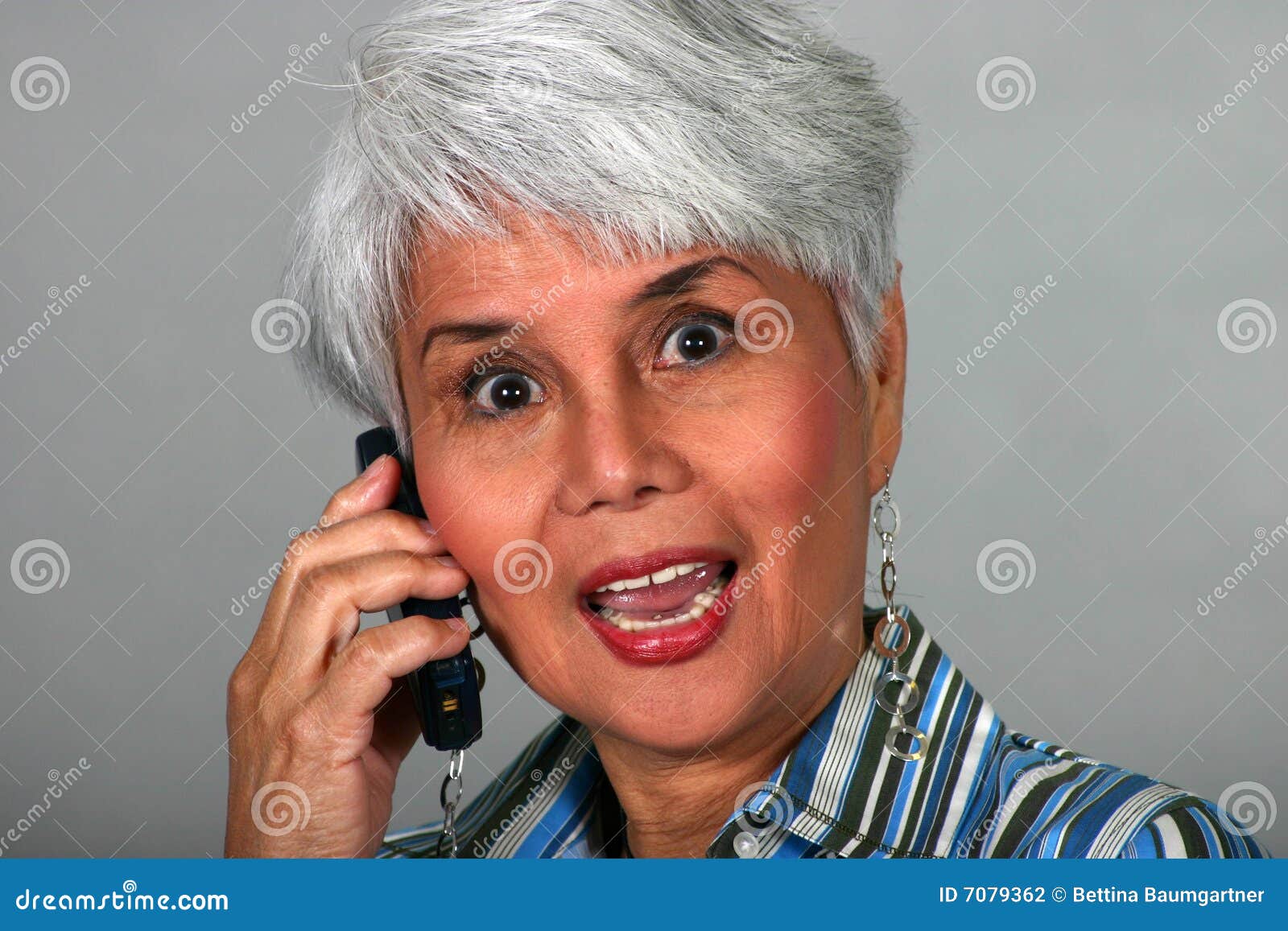 Mature Woman Using a Cell Phone Stock Photo - Image of beautiful, laugh ...
