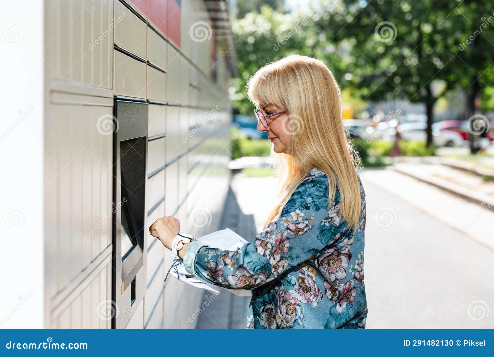 Mature Woman Using Parcel Locker Stock Photo - Image of elderly, enjoy ...