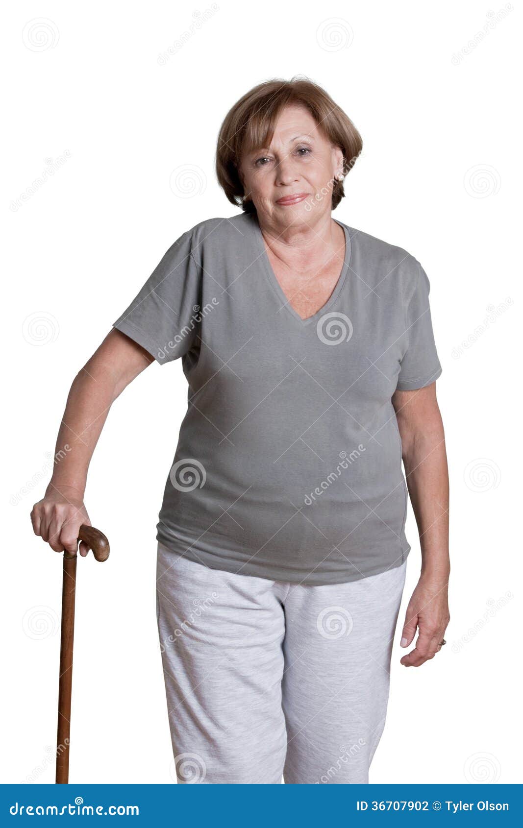 Mature Woman with Walking Stick Stock Photo - Image of casual, portrait ...