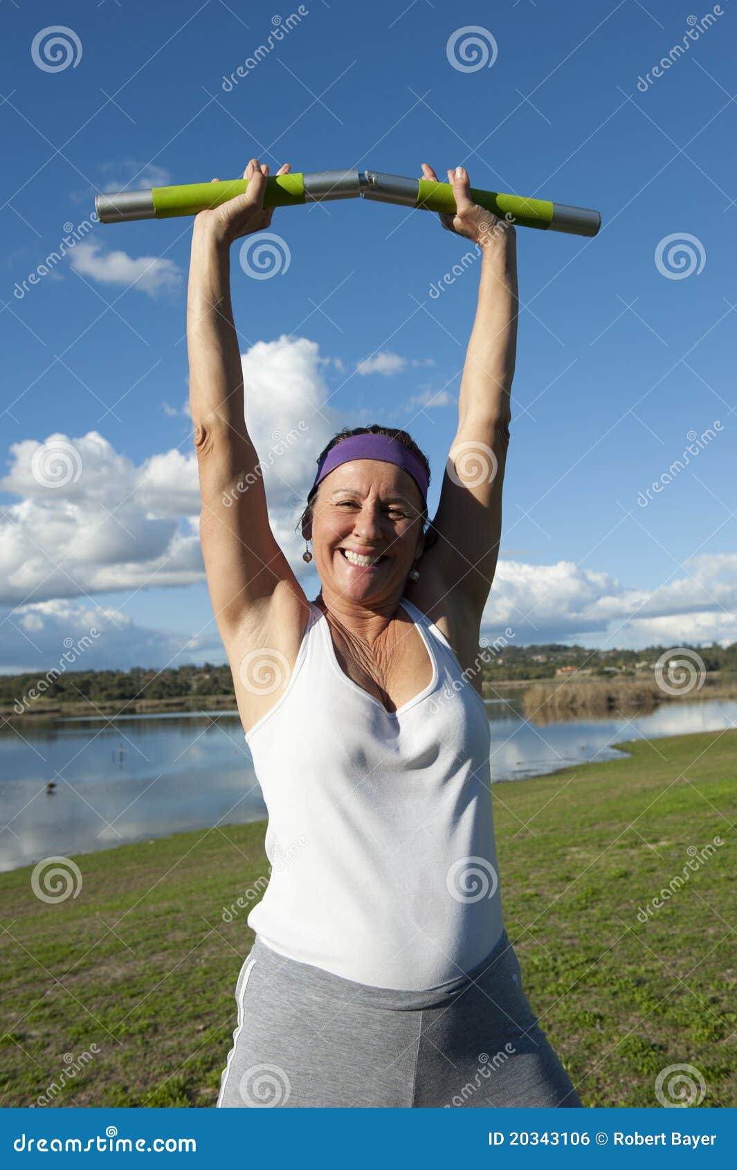 Mature Woman in Winner Pose Stock Photo - Image of blue, body: 20343106