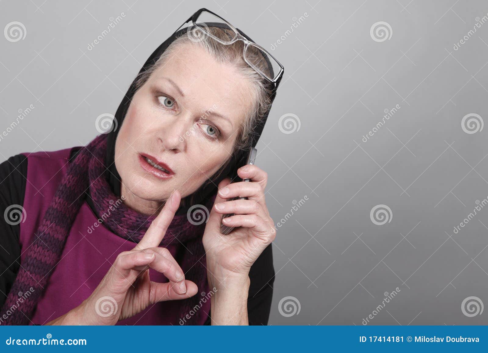 Mature women on the phone stock image. Image of hands - 17414181