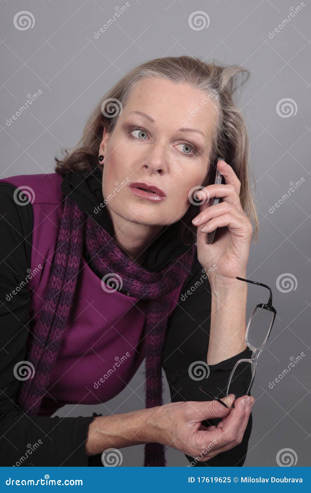 Mature women on the phone stock image. Image of phone - 17619625