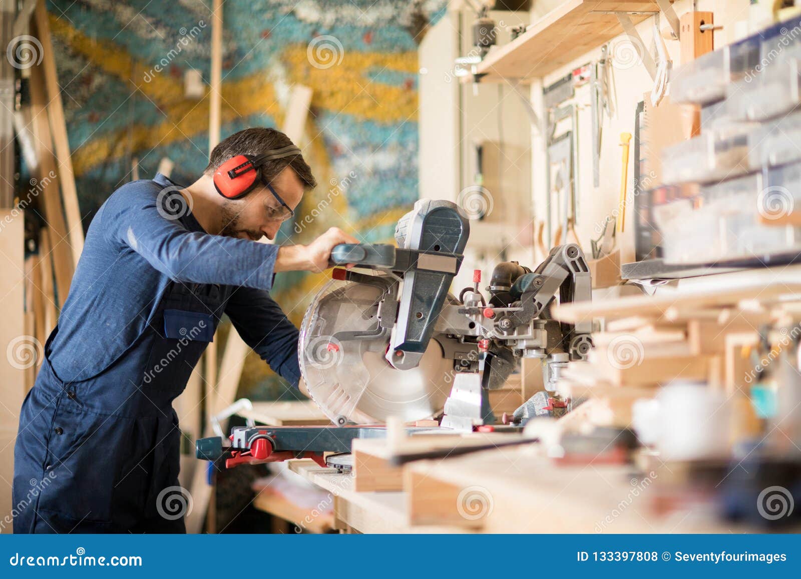 Mature Worker Cutting Wood stock photo. Image of woodwork - 133397808