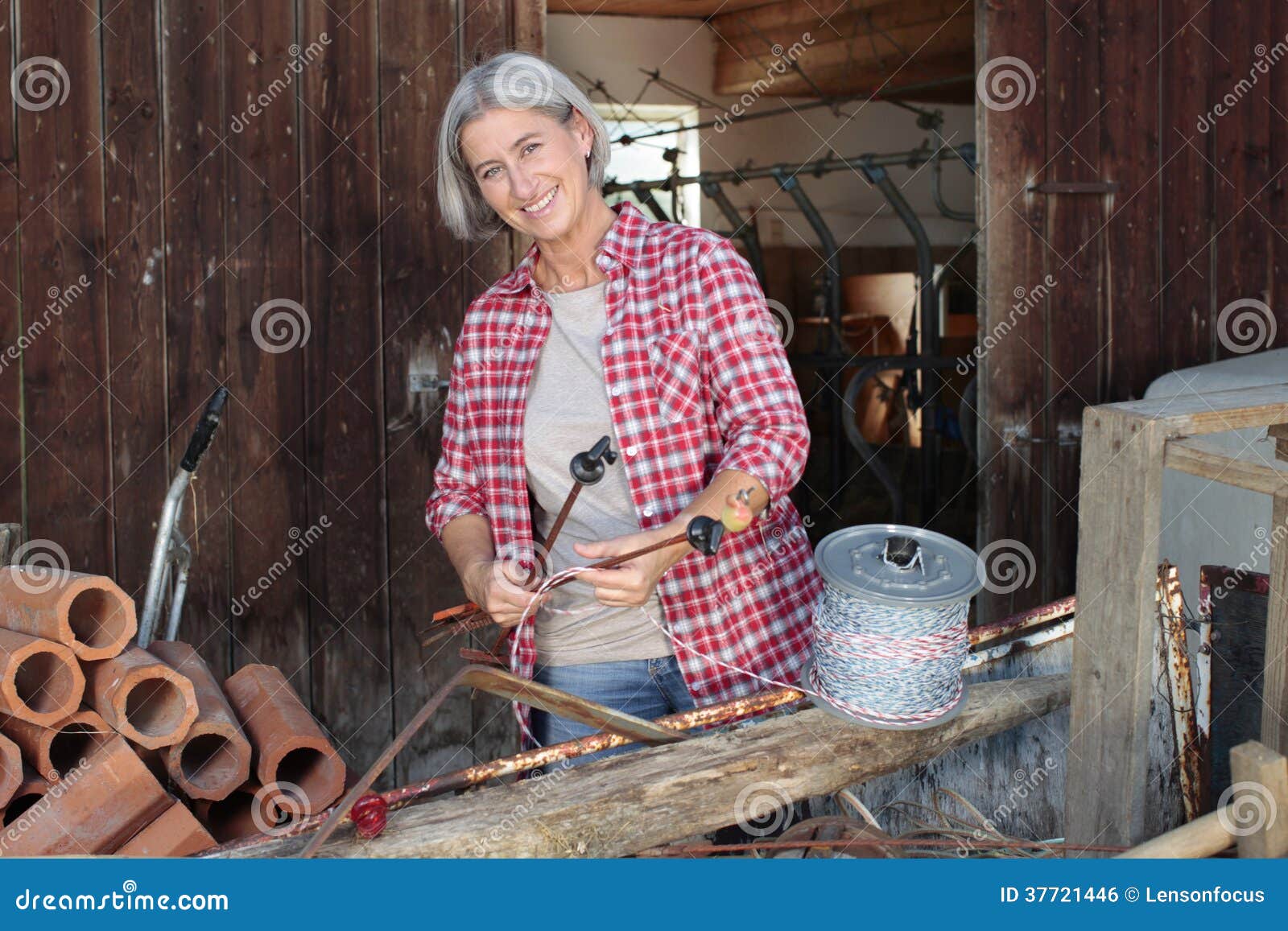 Matured farm woman at work stock photo. Image of working - 37721446