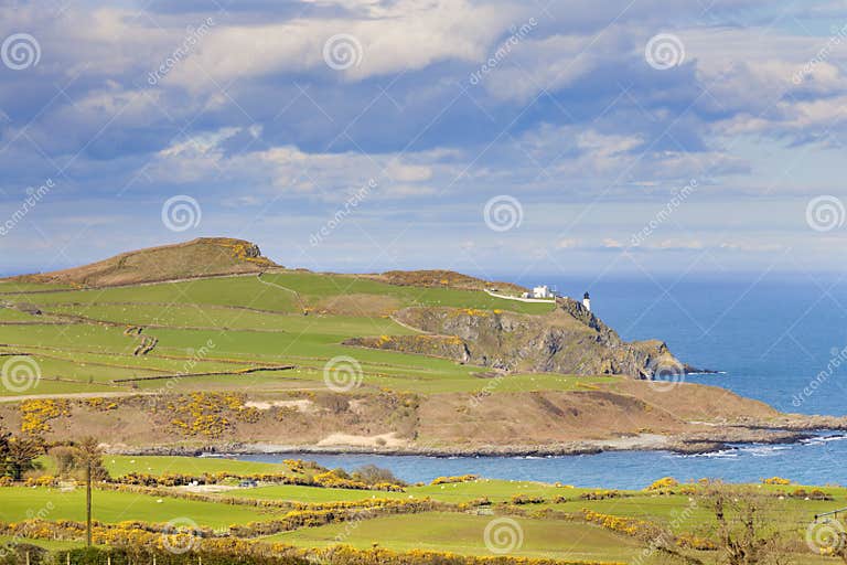 Maughold Head Lighthouse on the Isle of Man Stock Photo - Image of blue ...
