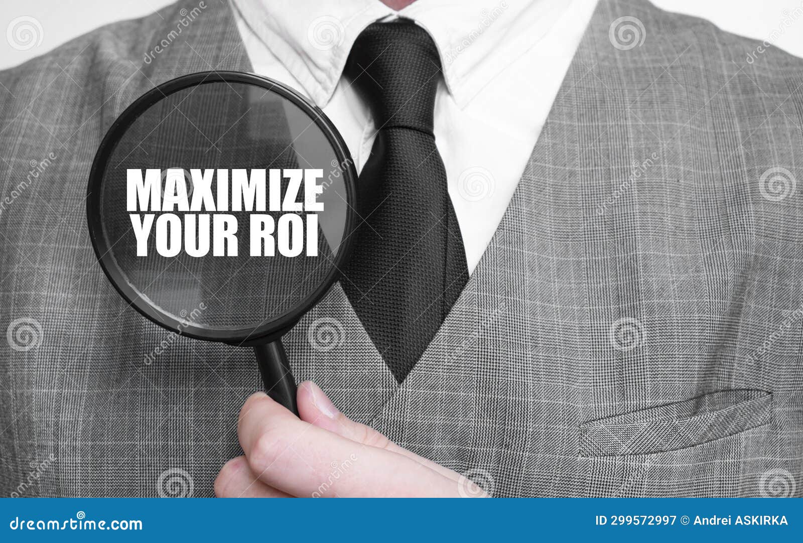 MAXIMIZE YOUR ROI on Magnifying Glass and Businessman Stock Image ...
