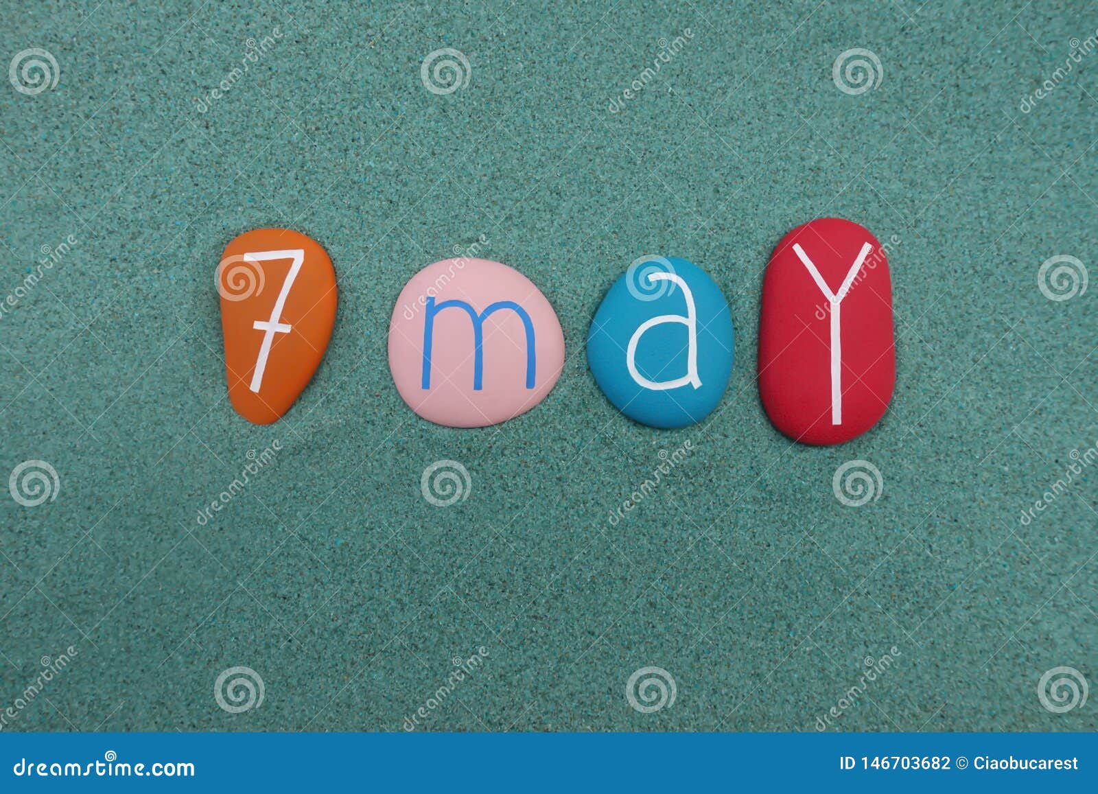 7 May, Calendar Date with Colored Stones Over Green Sand Stock Photo ...