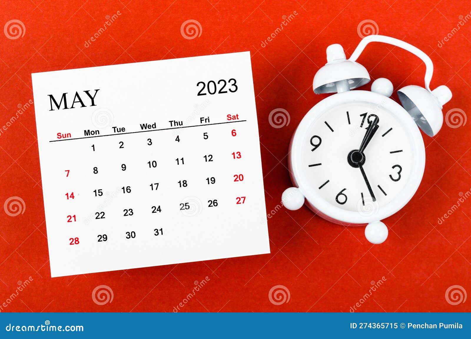 The May 2023 Monthly Calendar Year With Alarm Clock On Red Background ...
